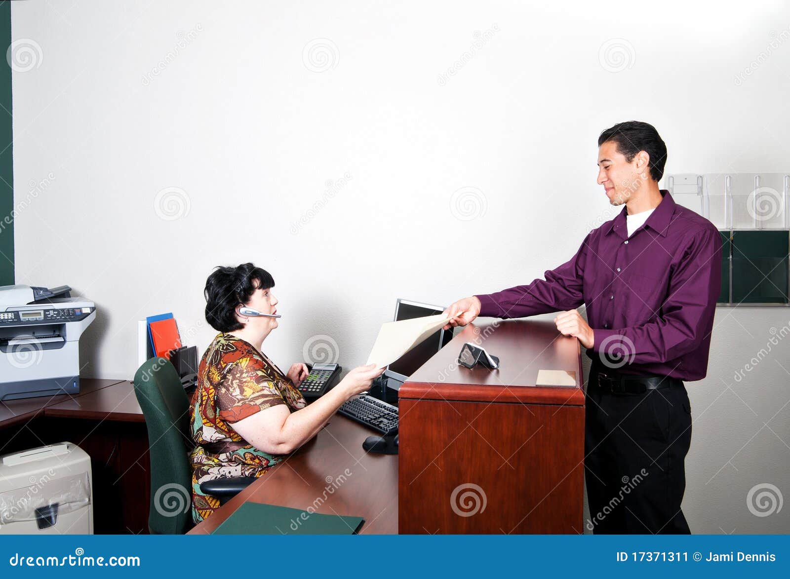 Receiving Paperwork stock image. Image of sitting, receptionist - 17371311