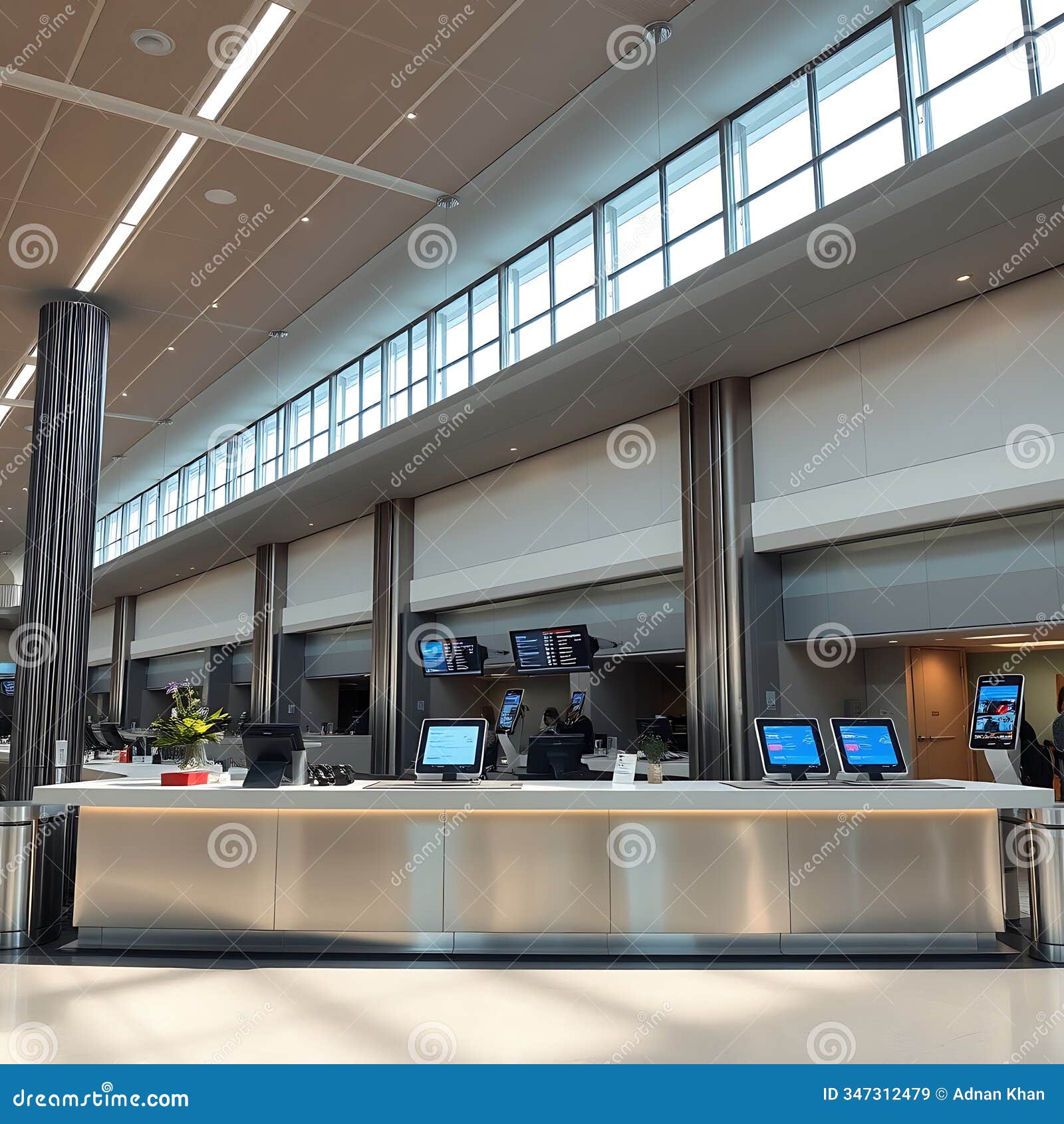 A Reception Desk at an Airport with High Ceilings Metal Accents and ...