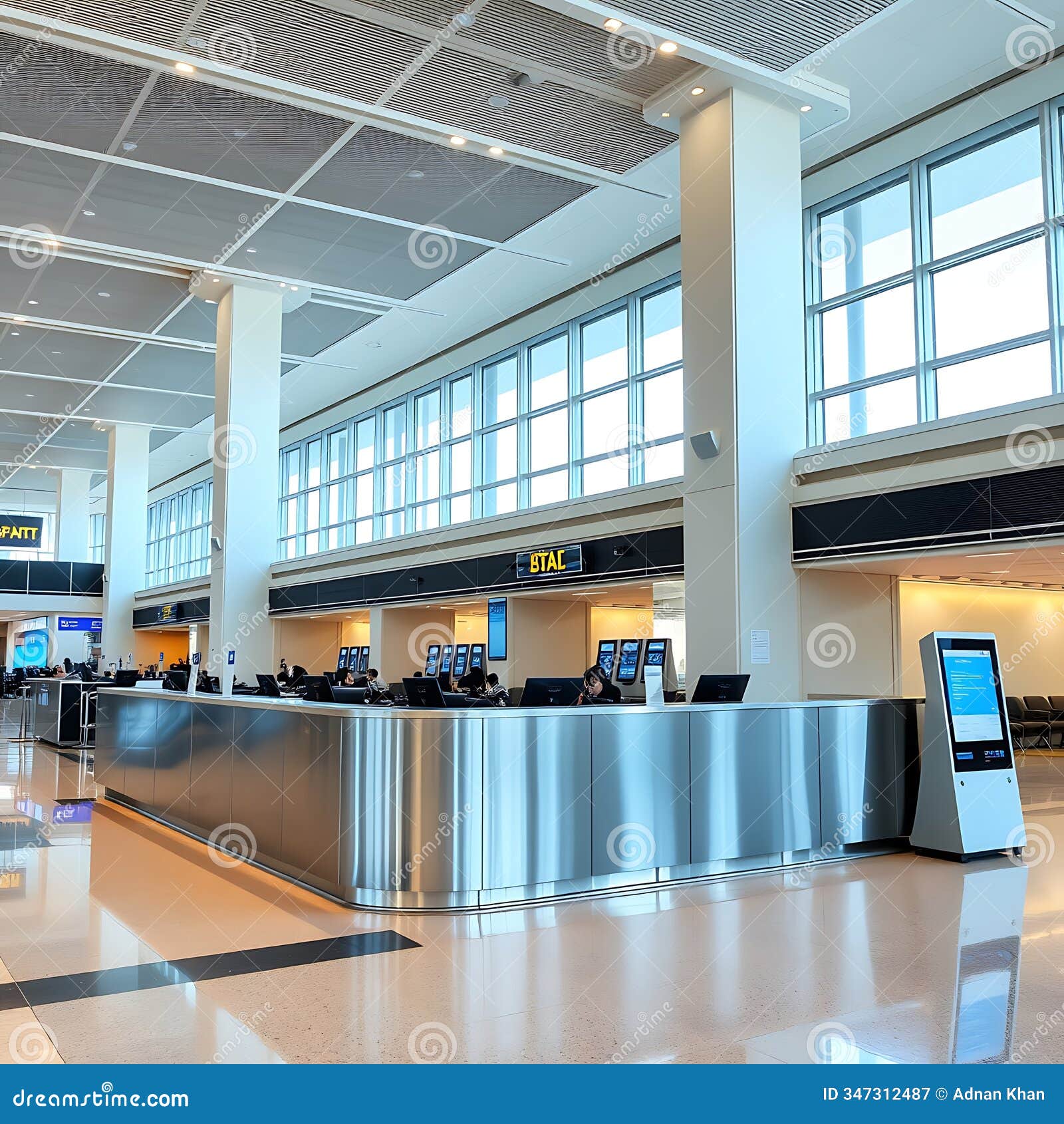 A Reception Desk at an Airport with High Ceilings Metal Accents and ...