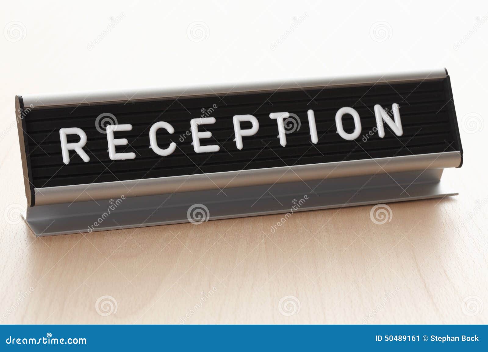 Reception sign on desk stock image. Image of german, hotel - 50489161
