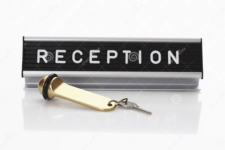 Reception Sign with Hotel Key Stock Photo - Image of reception, keyring ...