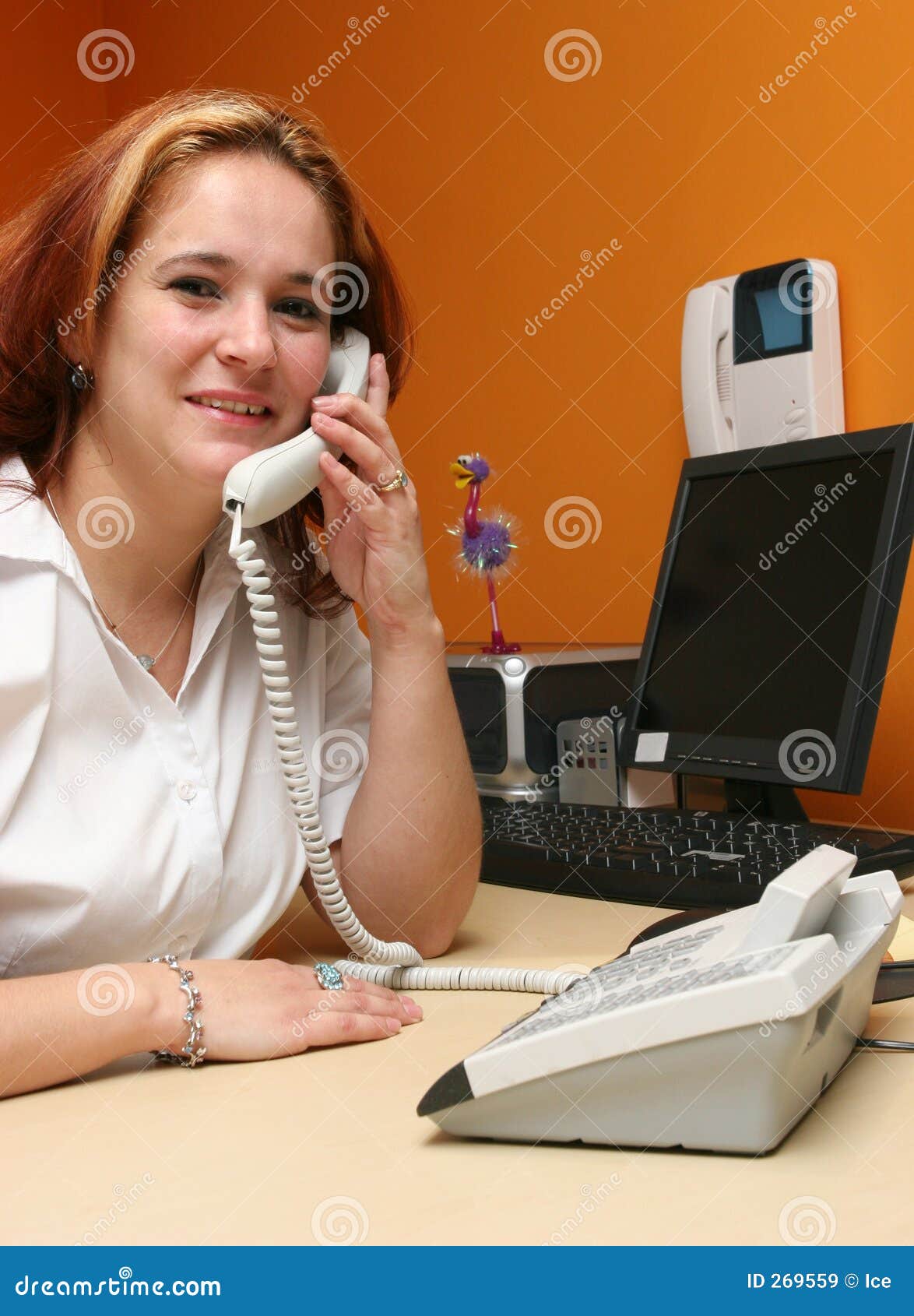 Receptionist Answering Her Company S Phone Stock Image - Image of smile ...