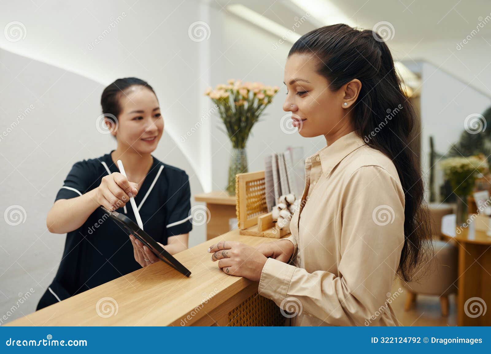 Receptionist Answering Phone Call Stock Photo - Image of smile, data ...