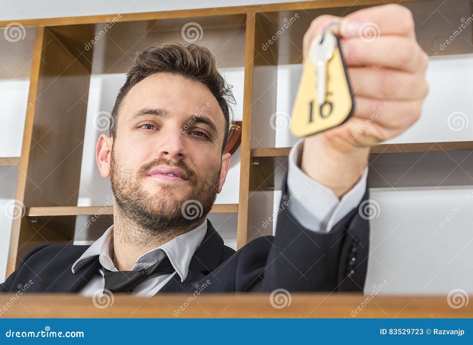 Receptionist Giving the Key Stock Image - Image of motel, portrait ...