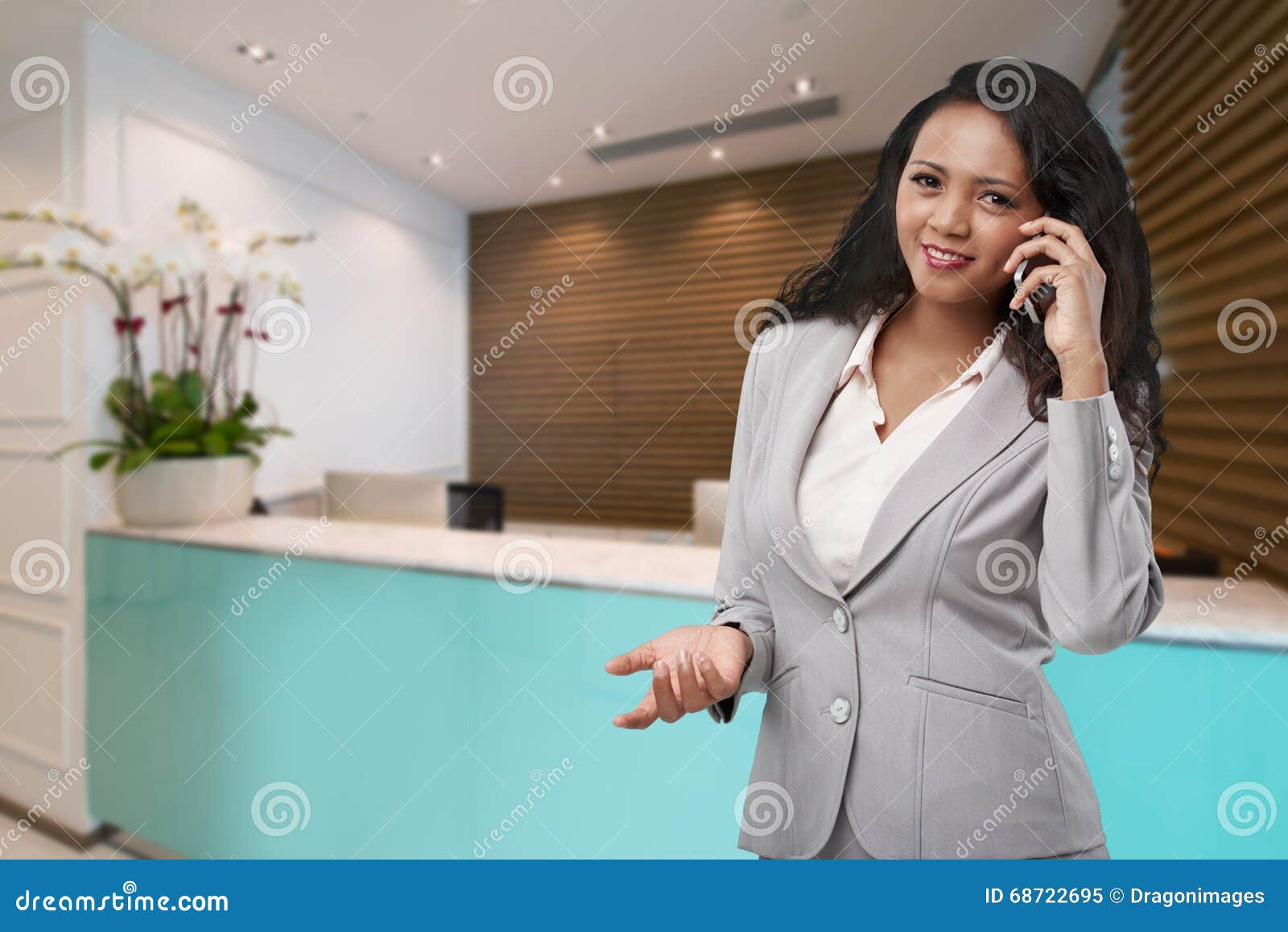 Receptionist on the phone stock image. Image of tablet - 68722695