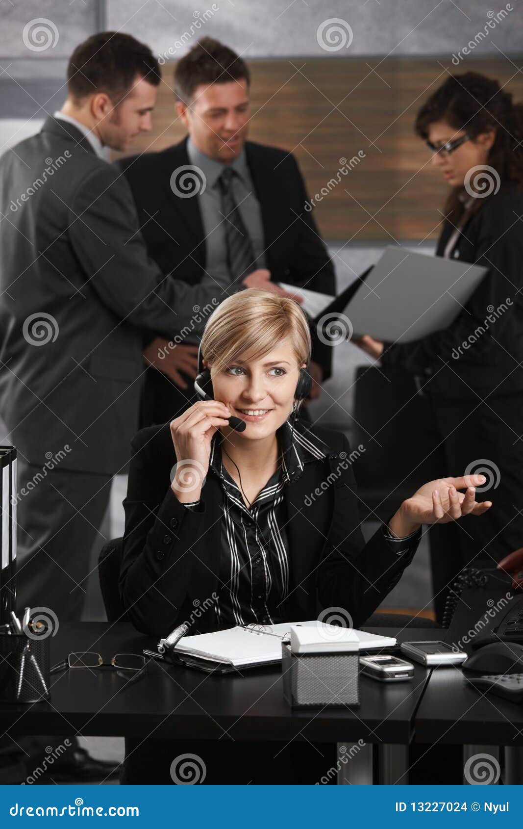 Receptionist Receiving Calls Stock Photo - Image of gray, coworkers ...