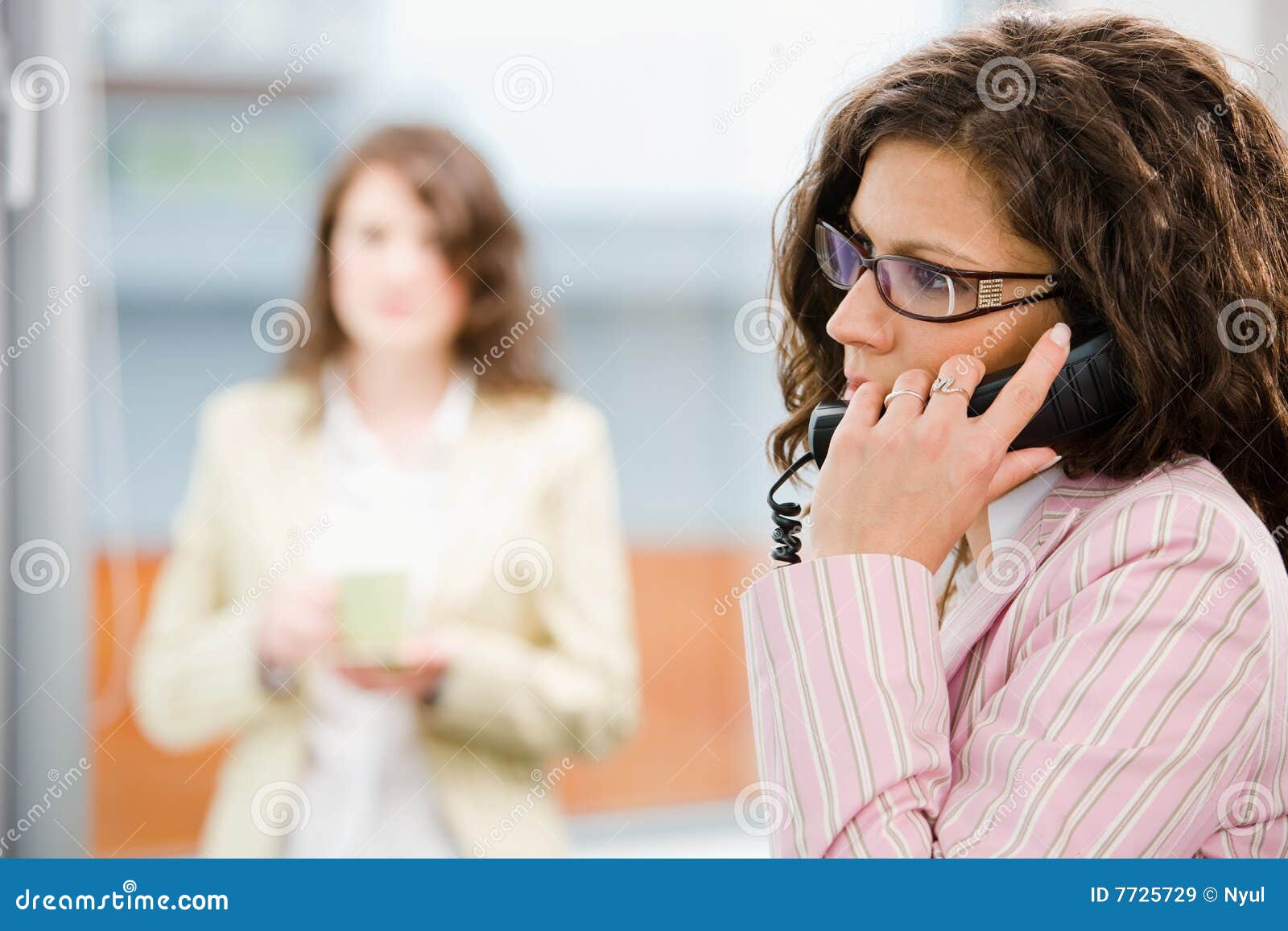 Receptionist Receiving Phone Calls Stock Image - Image of businesswomen ...