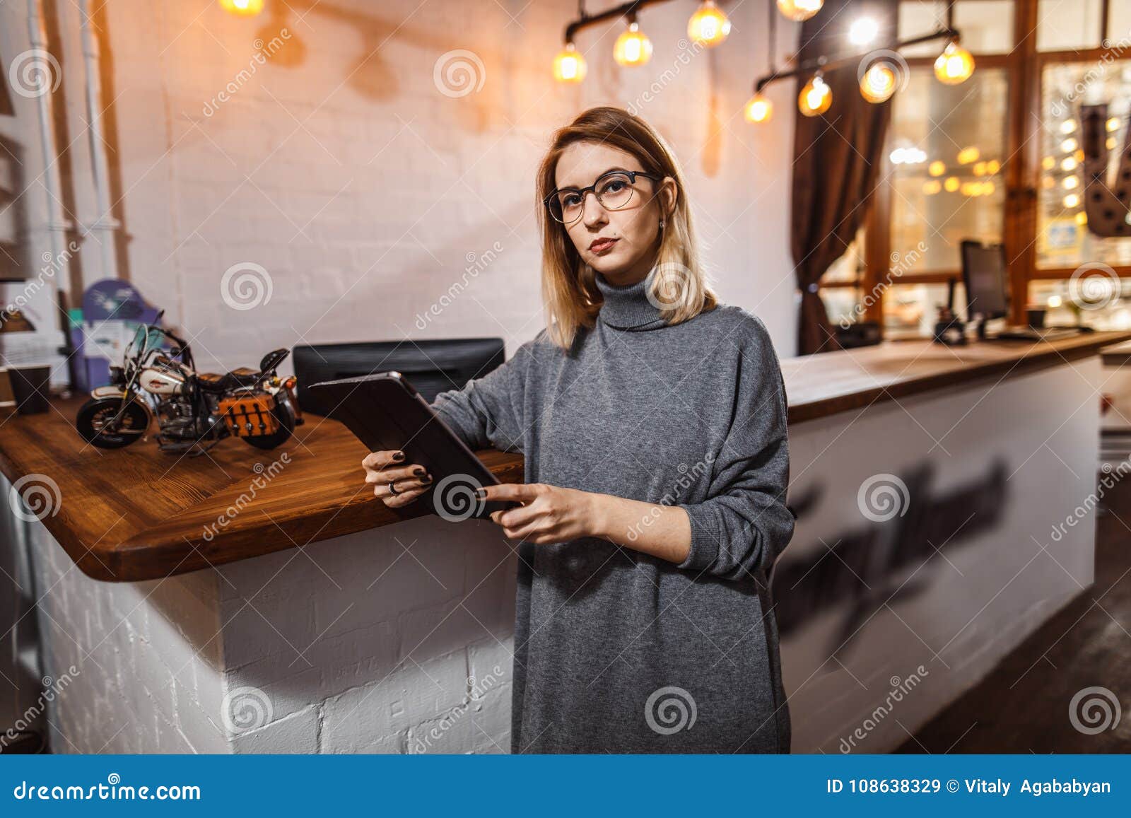 Receptionist Standing at Reception Counter in Office Stock Image ...