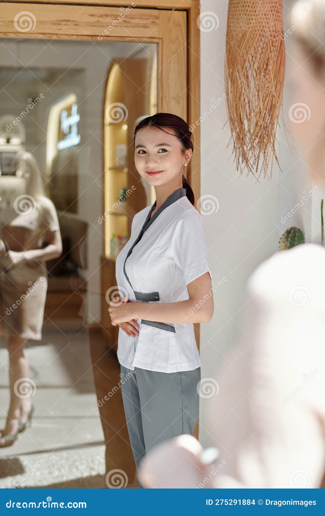 Receptionist Welcoming Client Stock Photo - Image of cheerful, happy ...