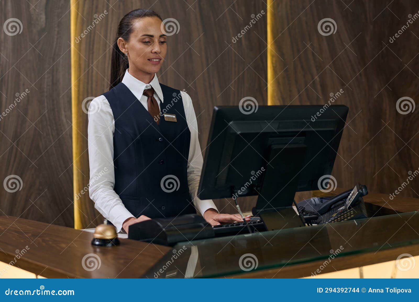 Receptionist Working on Computer in the Hotel Stock Photo - Image of ...