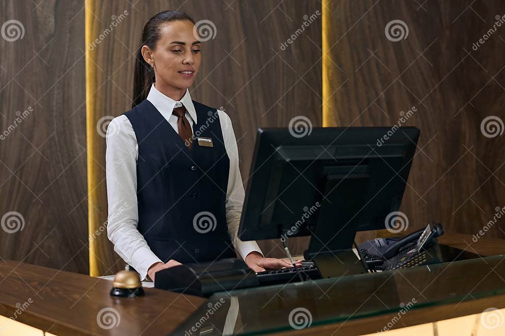 Receptionist Working on Computer in the Hotel Stock Photo - Image of ...
