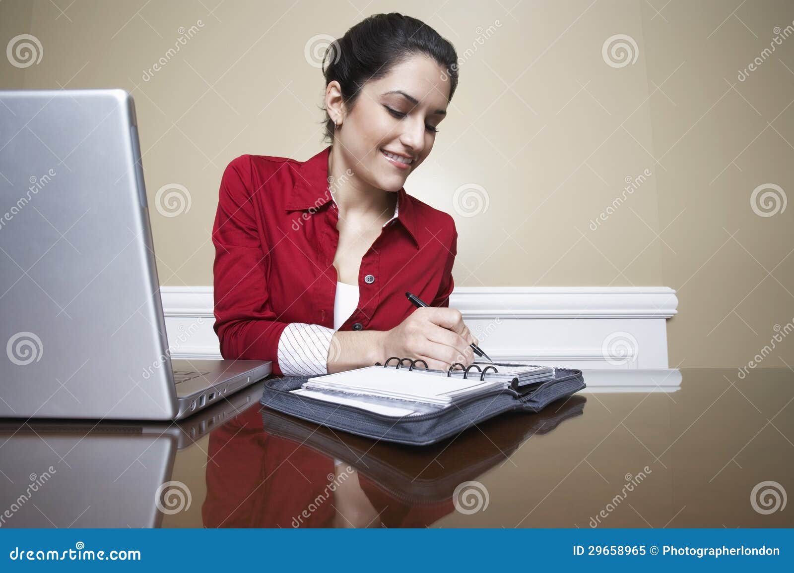 Receptionist Writing in Diary Stock Image - Image of office, notebook ...