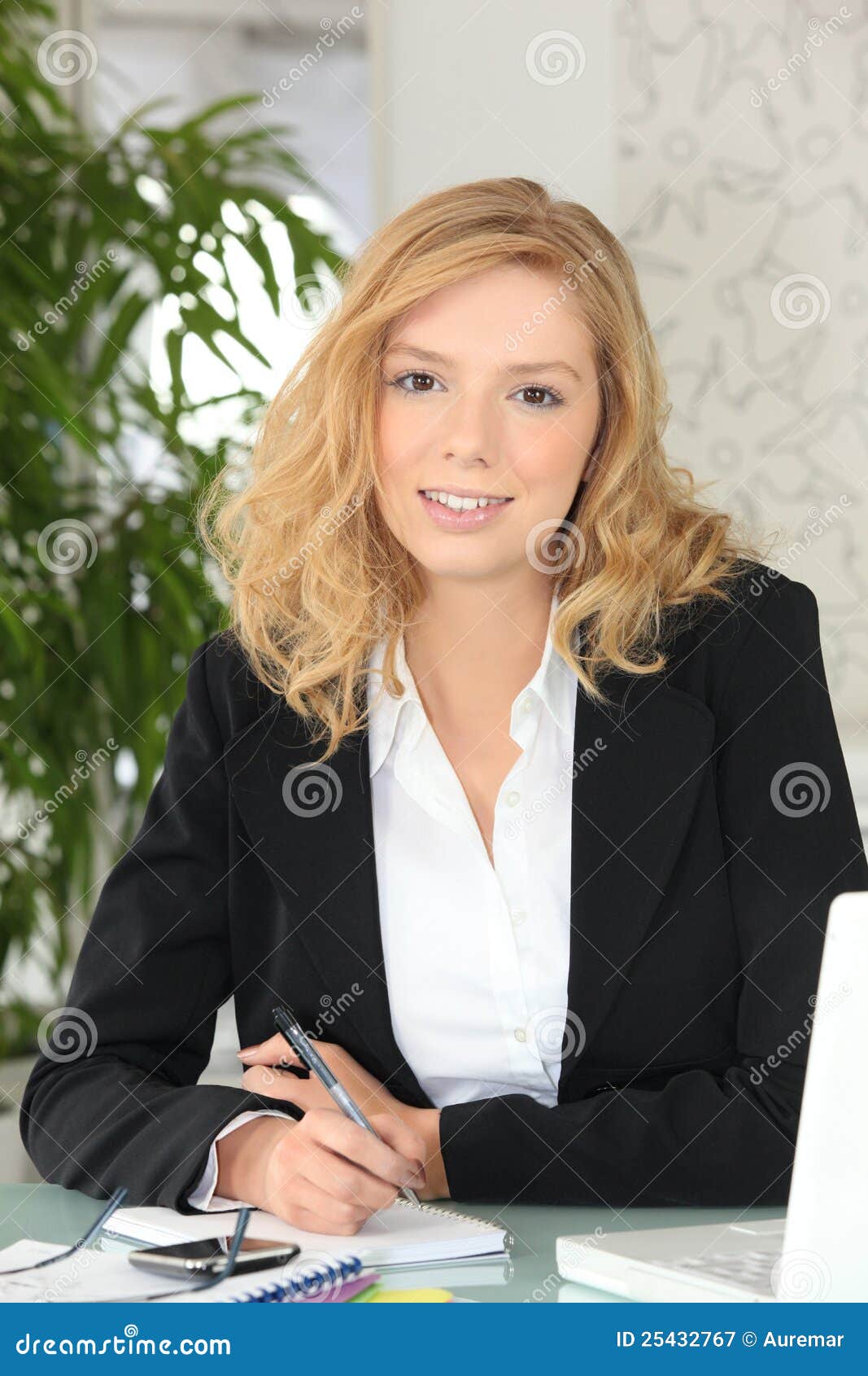 Receptionist Writing in Her Notebook Stock Image - Image of blond ...