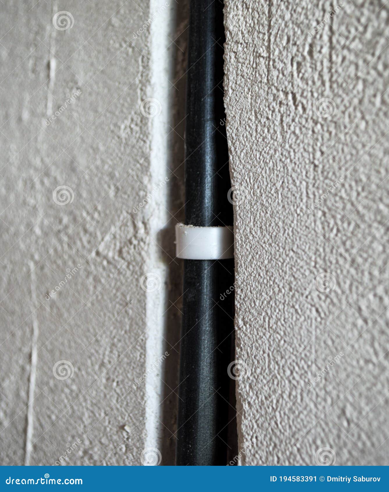 Recess in the Wall for the Wire. Repairs in the Apartment. Black ...