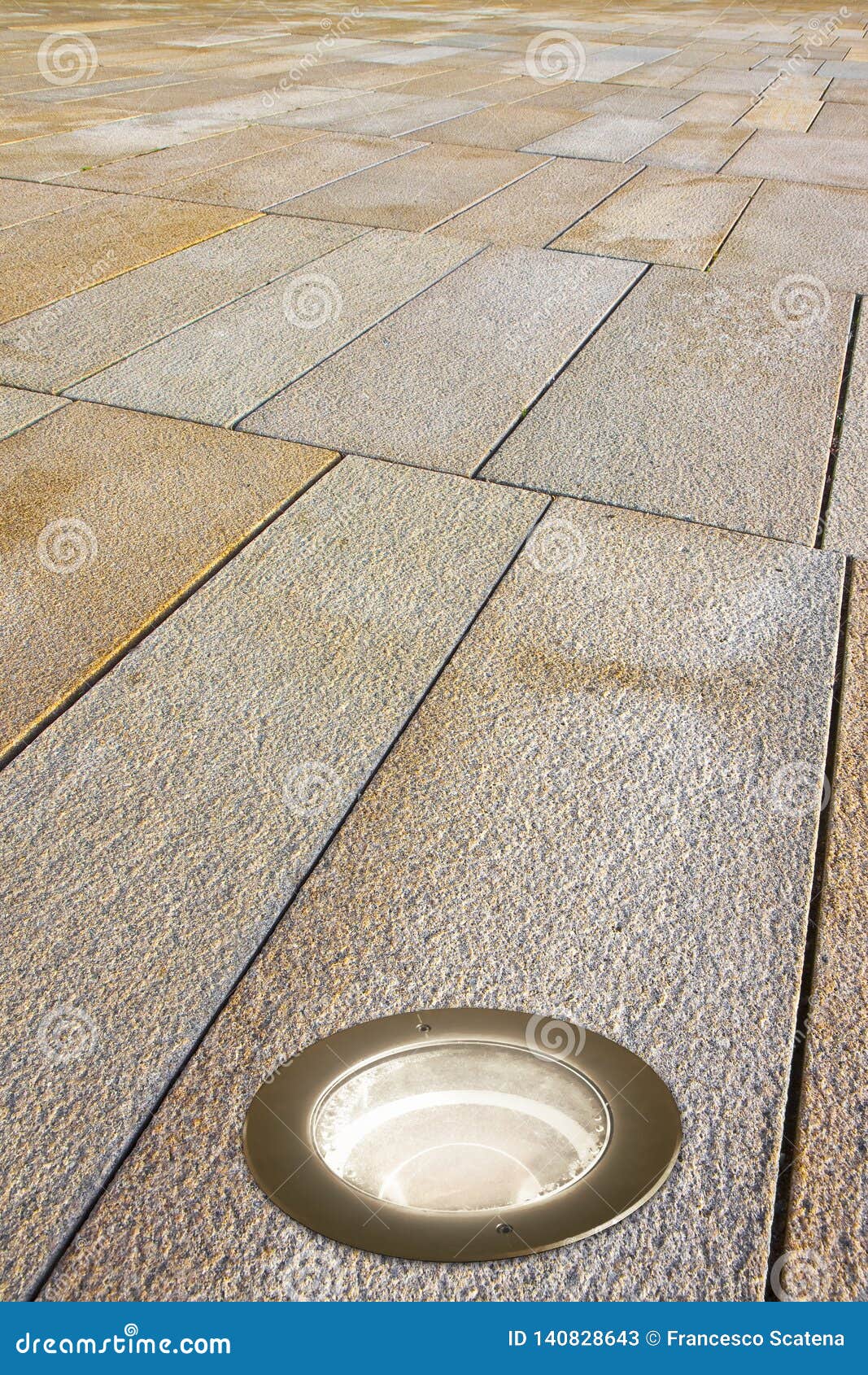 Recessed Floor Lamp on a Modern Stone Pavement Stock Image - Image of ...