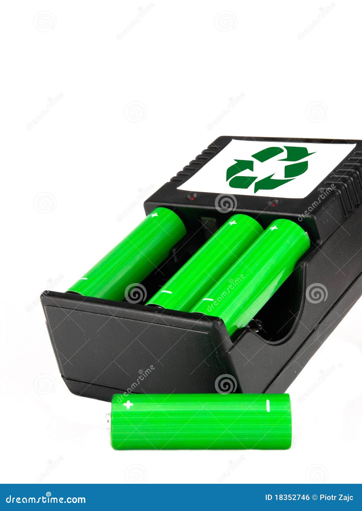Rechargeable Green Batteries with Black Charger on Stock Photo - Image ...