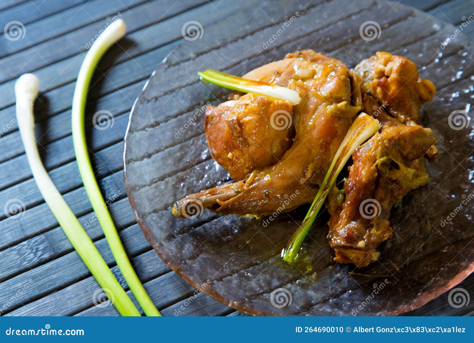 Fried Rabbit Cooked with Young Garlic and Onion. Typical Spanish Tapa ...
