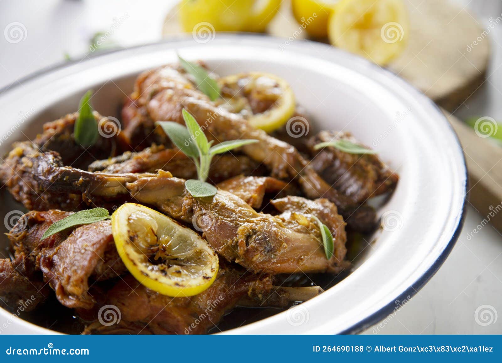 Fried Rabbit Cooked with Young Garlic and Sage. Typical Spanish Tapa ...