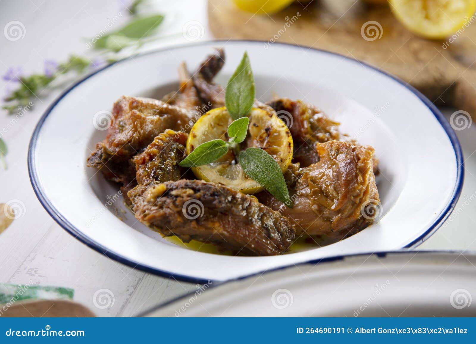 Fried Rabbit Cooked with Young Garlic and Sage. Typical Spanish Tapa ...