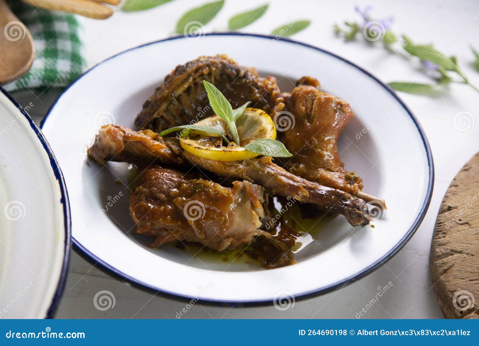 Fried Rabbit Cooked with Young Garlic and Sage. Typical Spanish Tapa ...