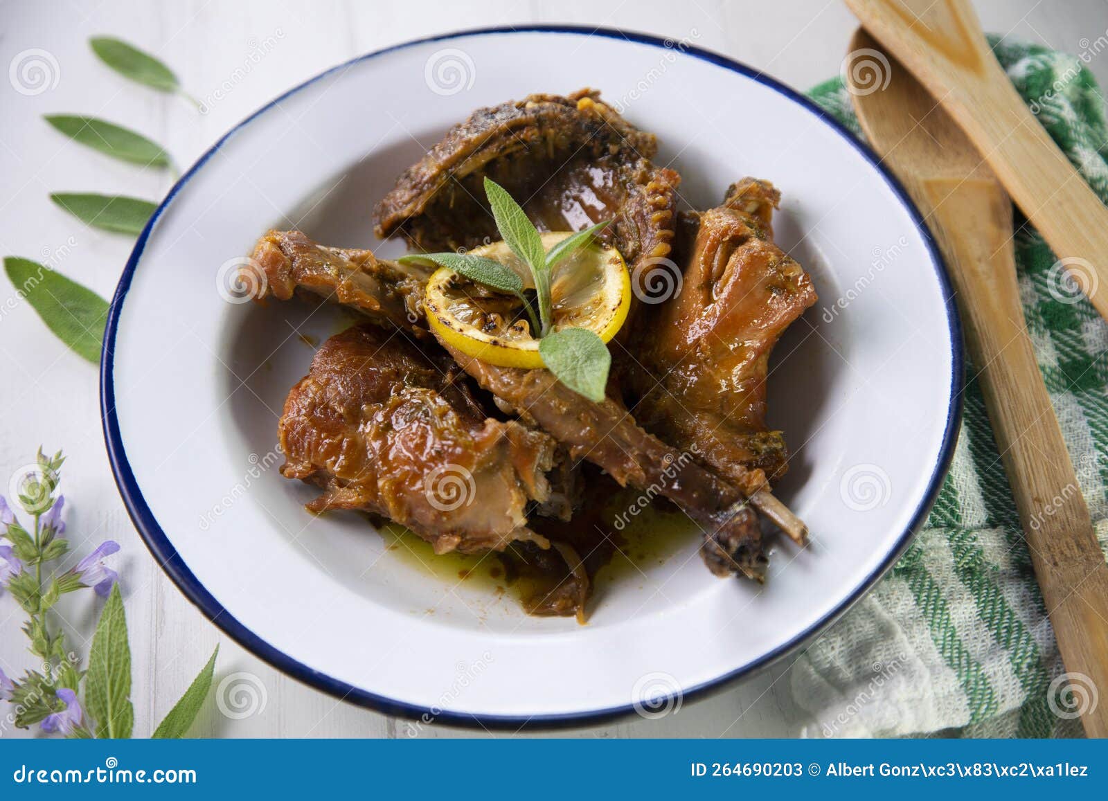 Fried Rabbit Cooked with Young Garlic and Sage. Typical Spanish Tapa ...