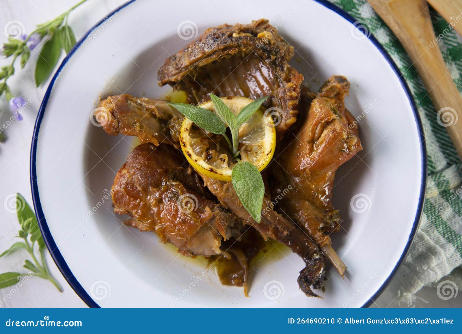 Fried Rabbit Cooked with Young Garlic and Sage. Typical Spanish Tapa ...