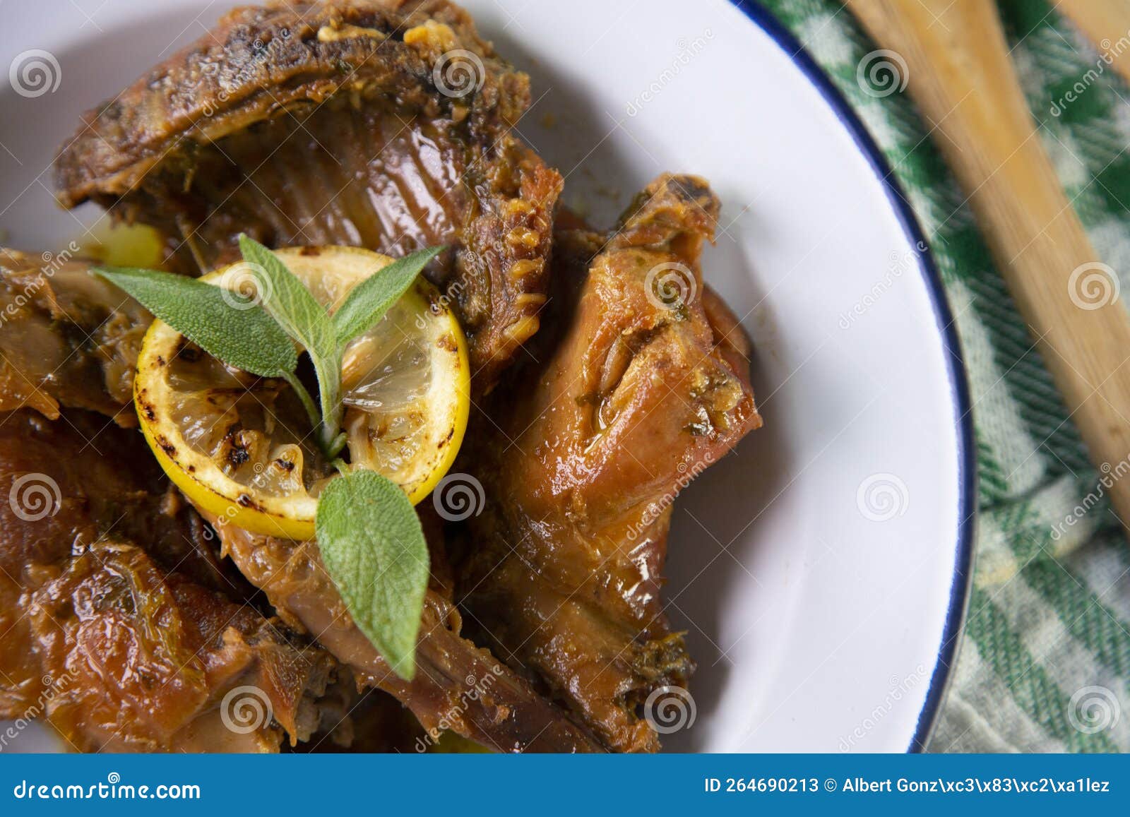 Fried Rabbit Cooked with Young Garlic and Sage. Typical Spanish Tapa ...