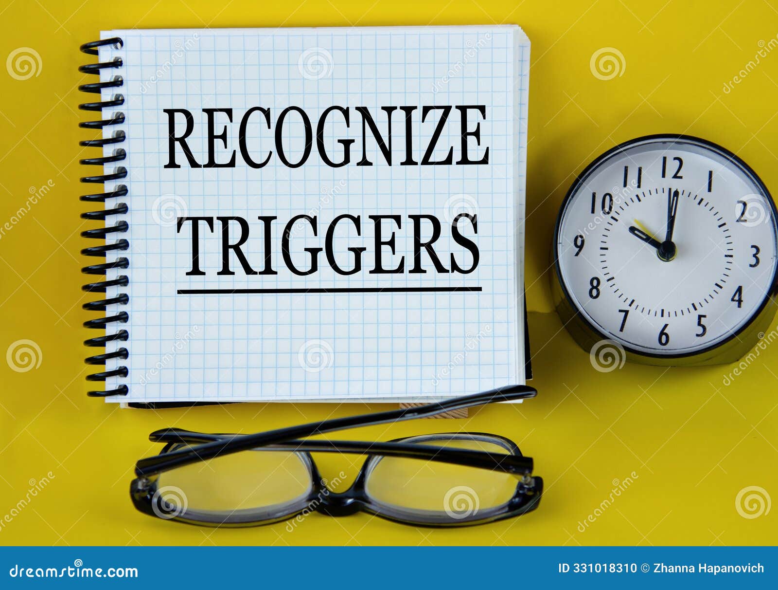 RECOGNIZE TRIGGERS - Words in a White Notebook with Alarm Clock and ...