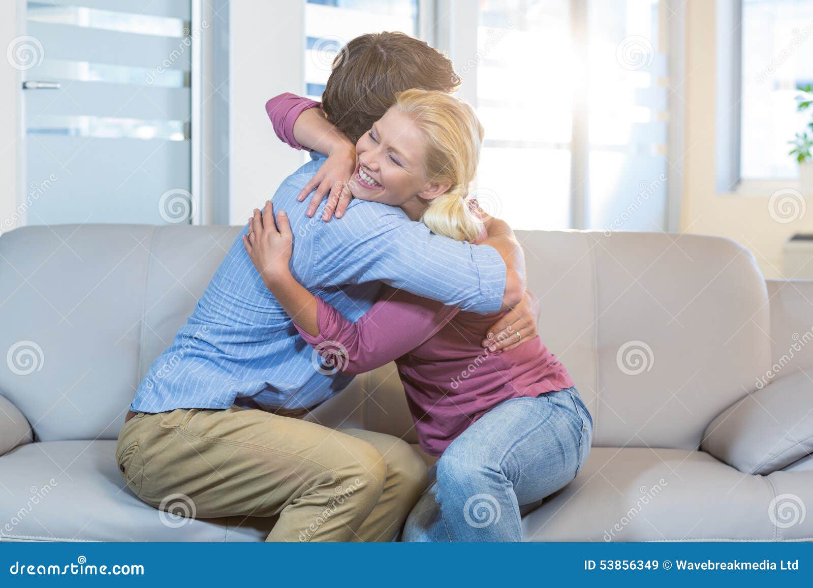 Reconciled couple hugging stock image. Image of girl - 53856349
