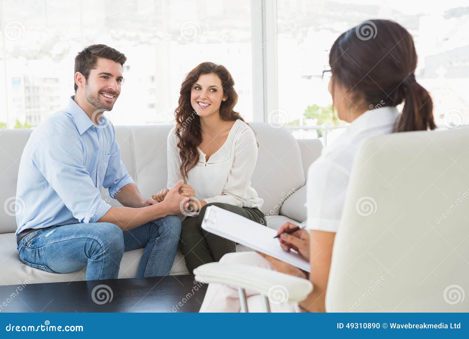 Reconciled Couple Smiling at Each Other Stock Photo - Image of ...