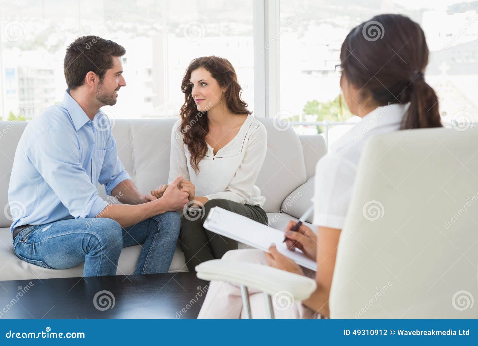 Reconciled Couple Smiling at Each Other Stock Photo - Image of happy ...
