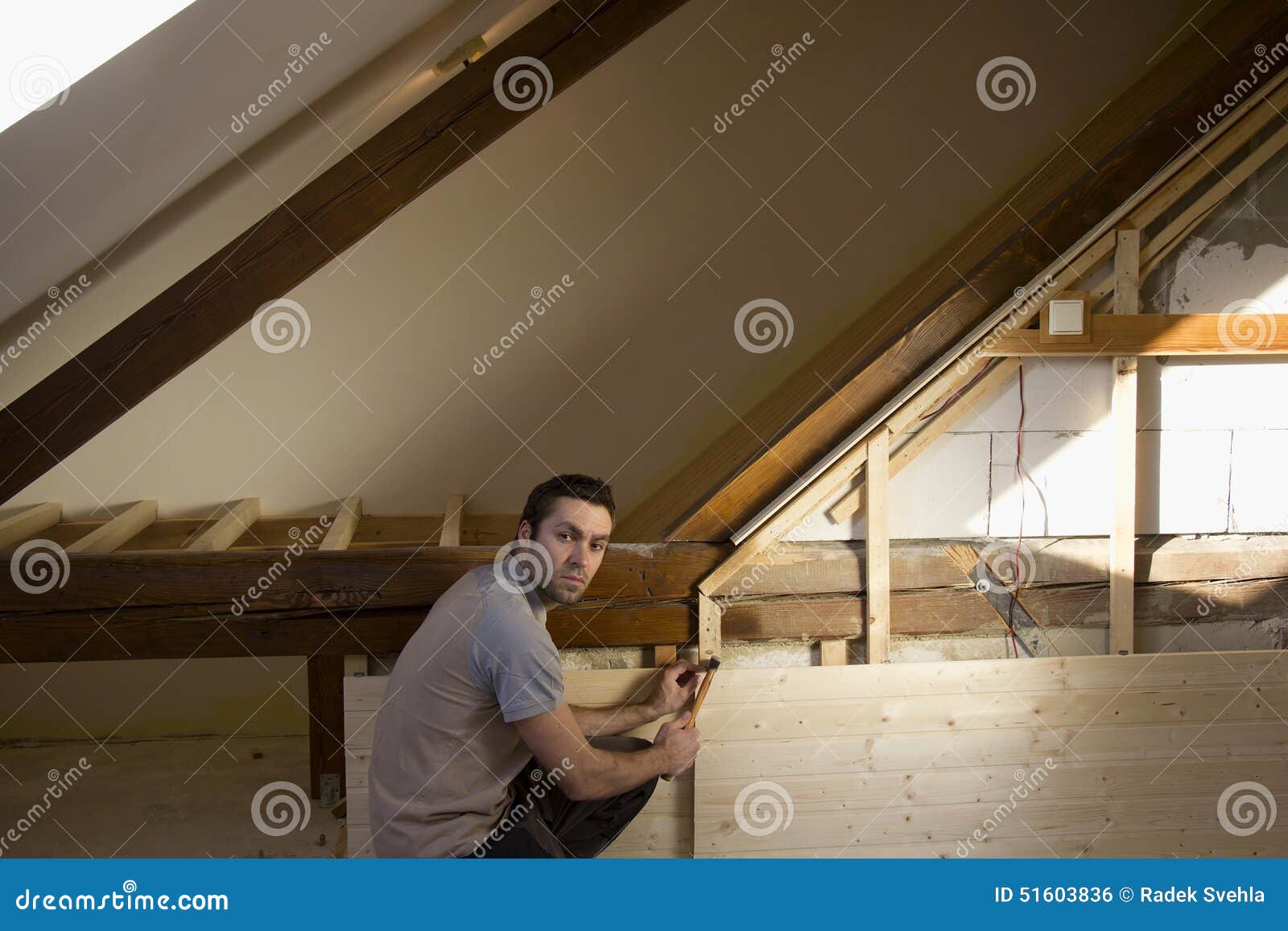 Attic Of A Building With Wooden Beams Of A Roof Structure And A Fire ...