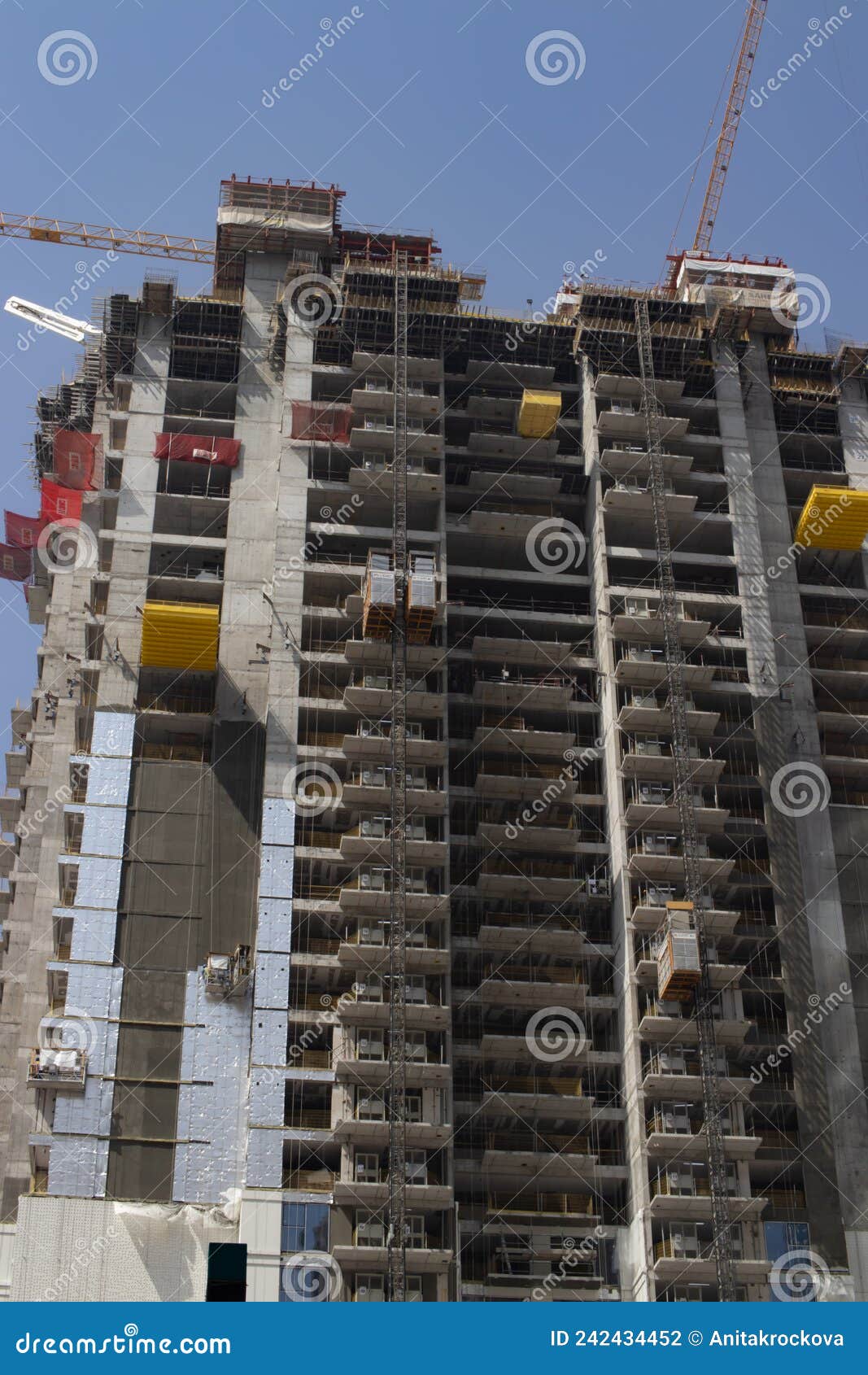 Reconstruction of Skyscraper, Building Repair with Cranes on the Top of ...