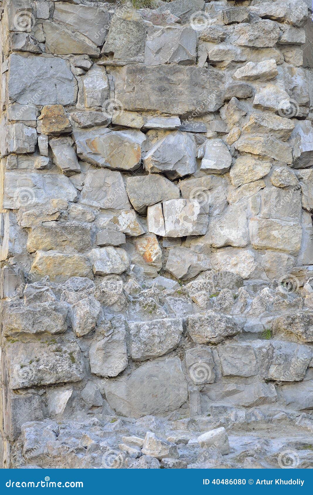 Reconstruction Of A Stone Wall. The Repaired Part With The Moss Removed ...