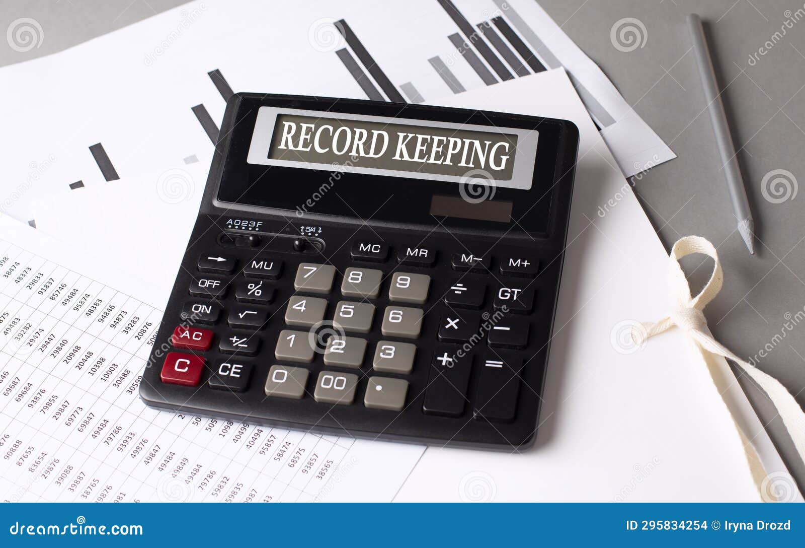 RECORD KEEPING Text On Calculator With Chart On Grey Background Stock ...