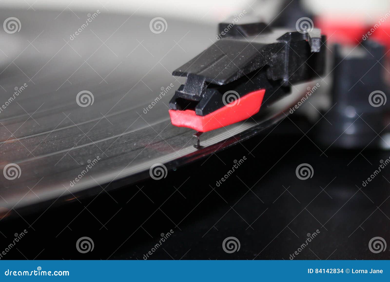 Record Player Stylus Arm on Vinyl Rotating Disc Background with Copy ...