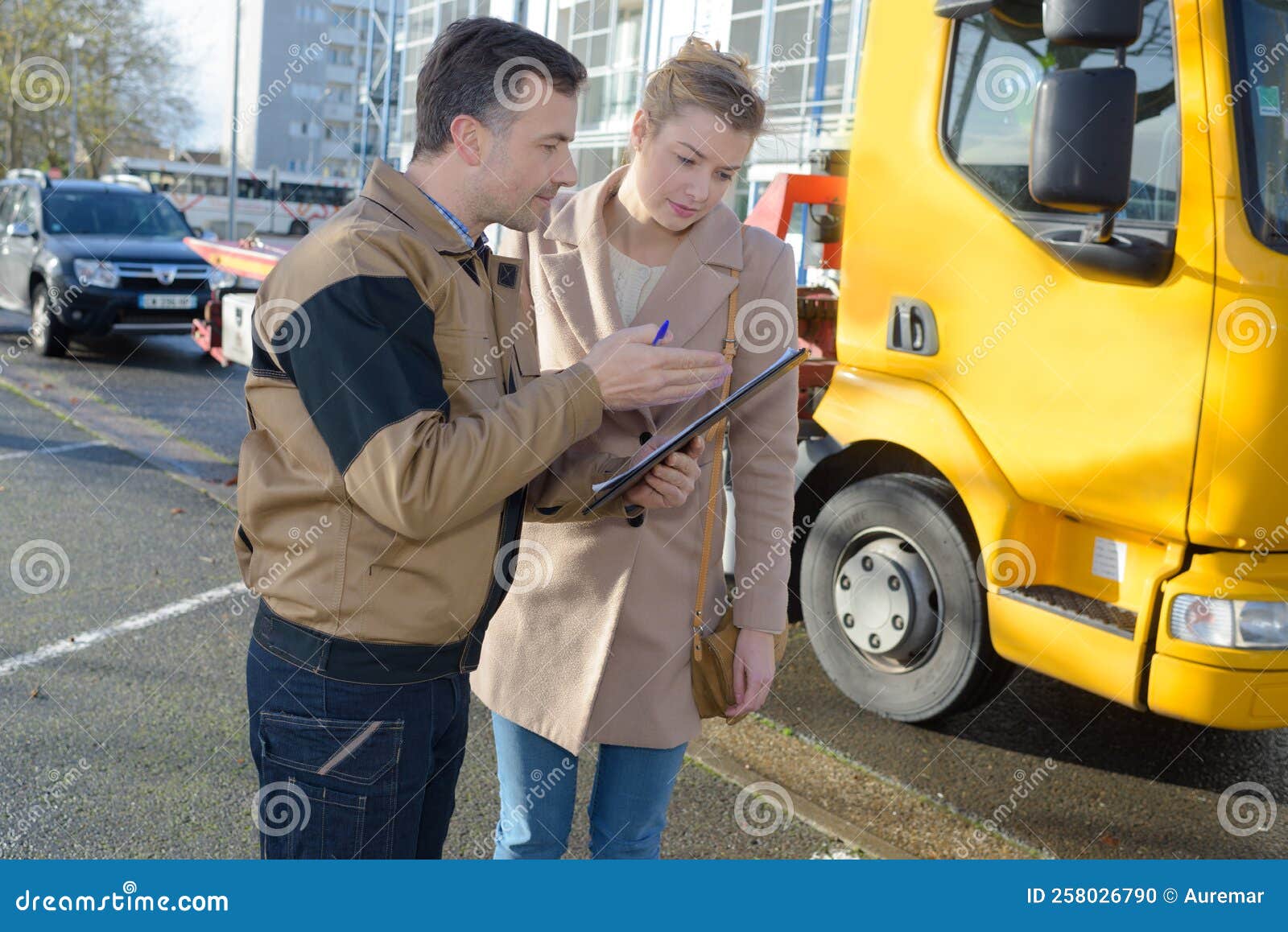 Recovery Driver Showing Paperwork To Customer Stock Photo - Image of ...