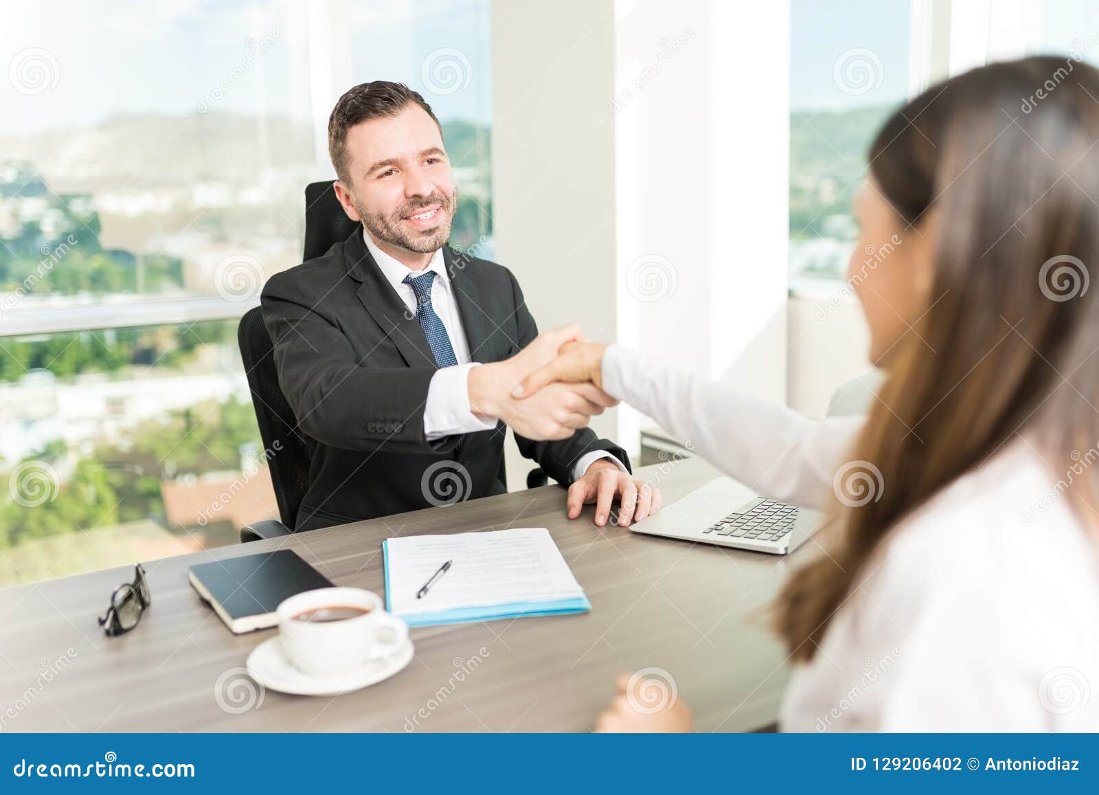 Recruiter Building Relationship with a Handshake during Interview Stock ...