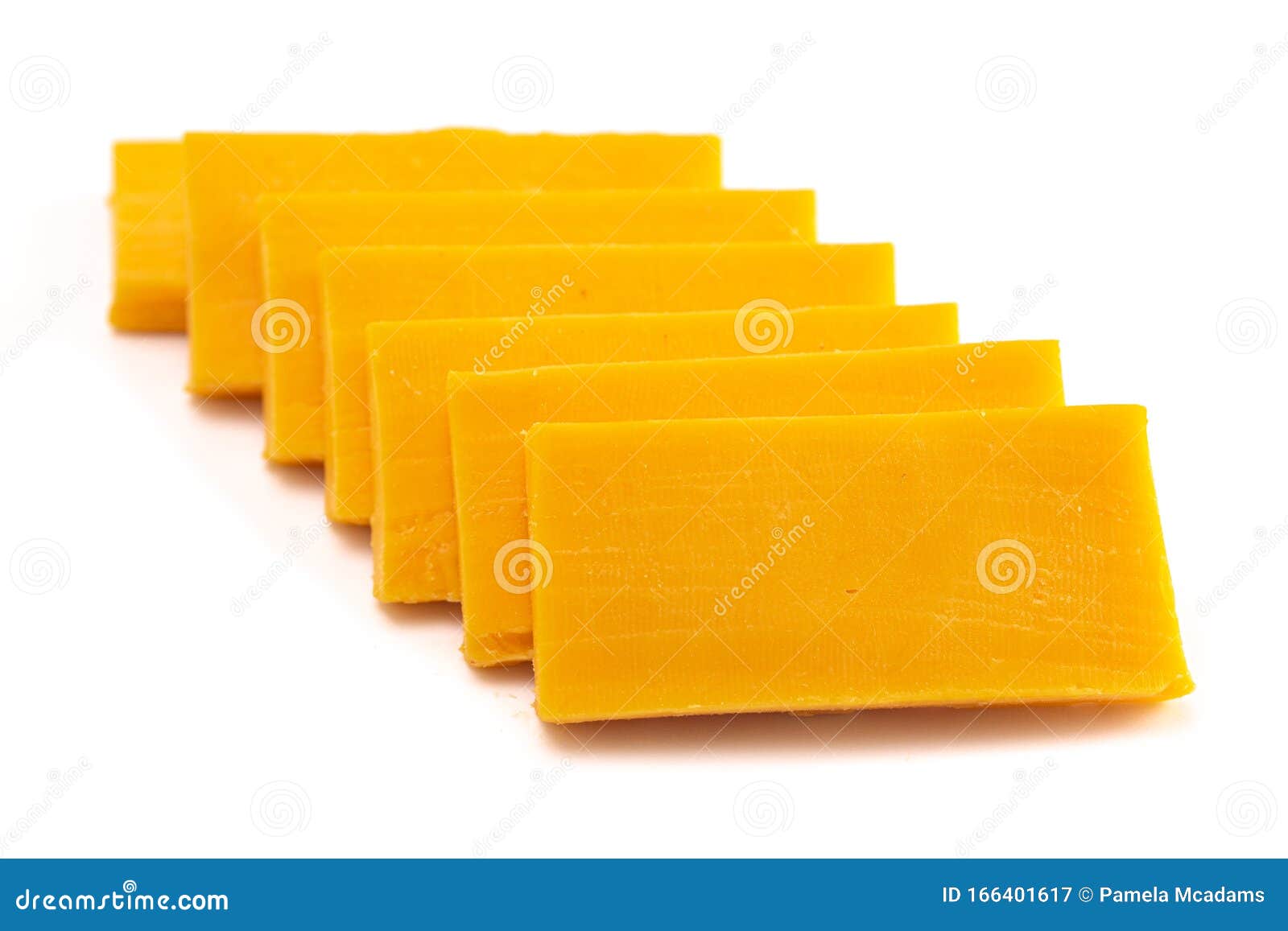 Rectangle Slices of Sharp Cheddar Cheese on a White Background Stock ...