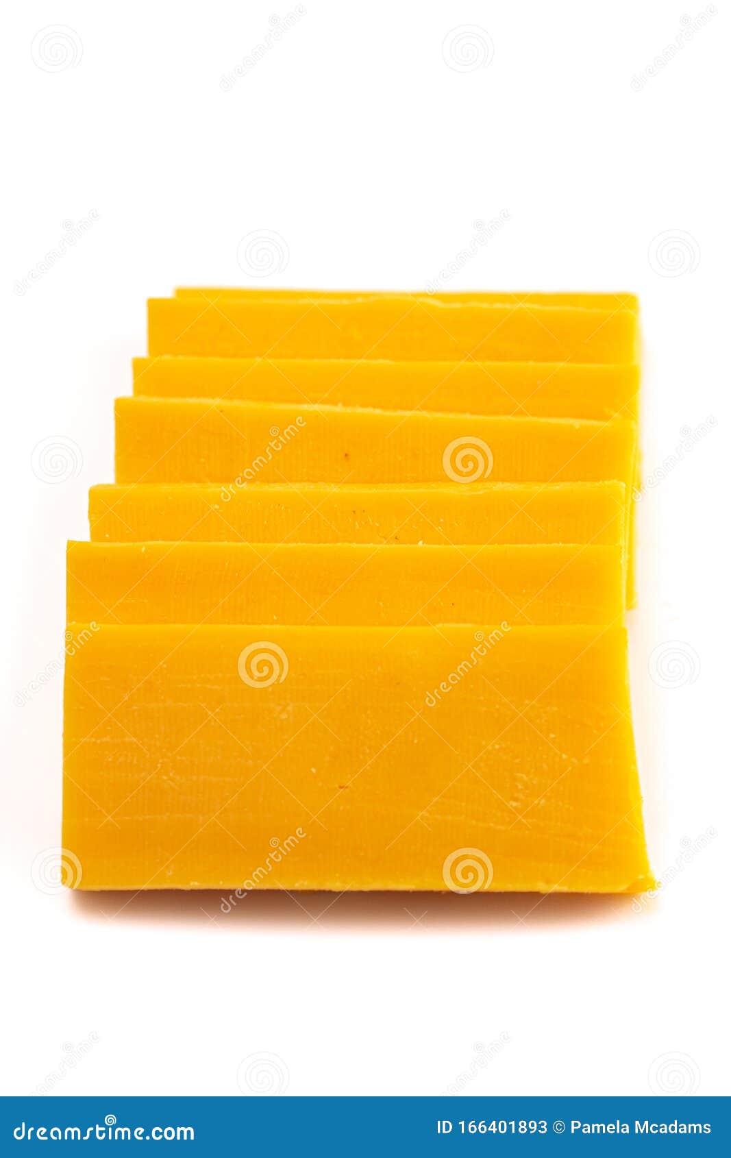 Rectangle Slices of Sharp Cheddar Cheese on a White Background Stock ...