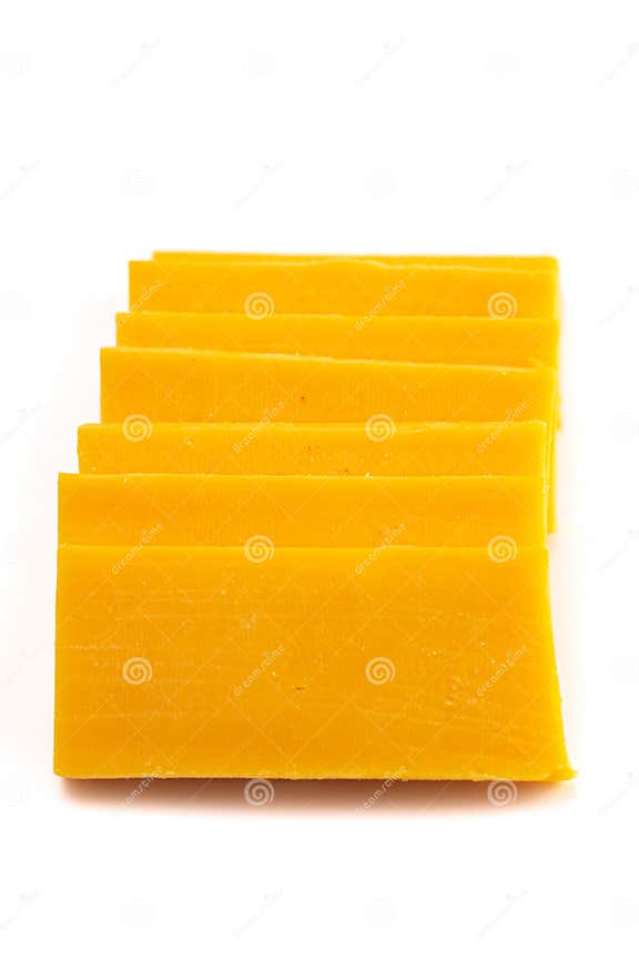 Rectangle Slices of Sharp Cheddar Cheese on a White Background Stock ...