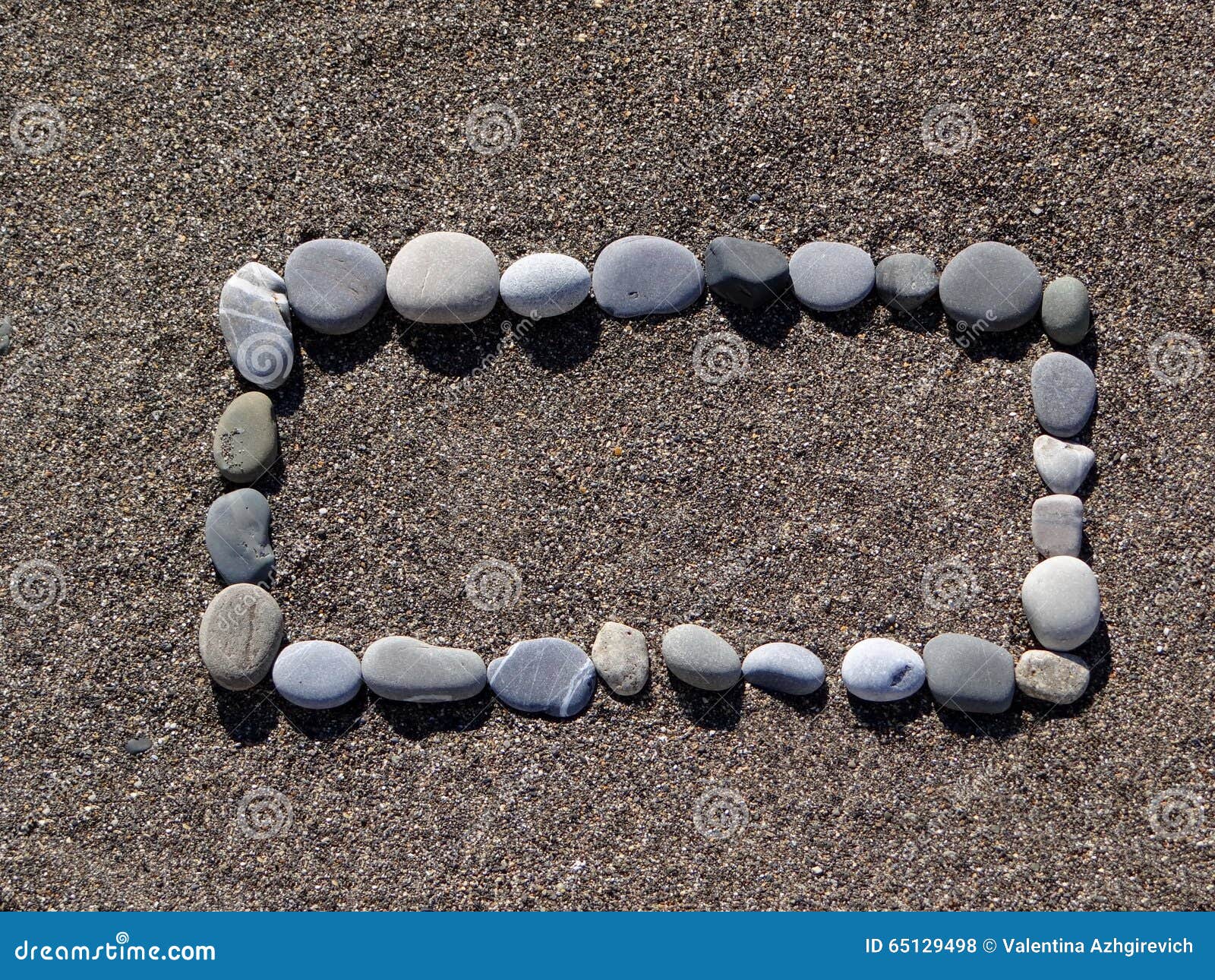 The Rectangle of Stones on the Sand Stock Photo - Image of sand, shape ...