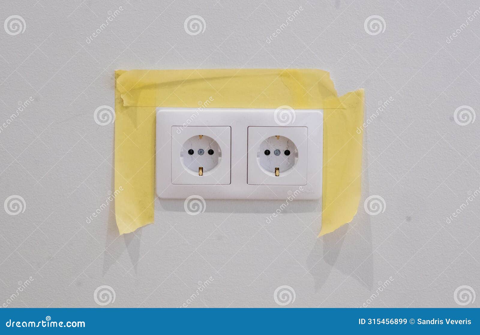 Rectangle Wall Socket Taped To Wall with Yellow Tape Stock Image ...