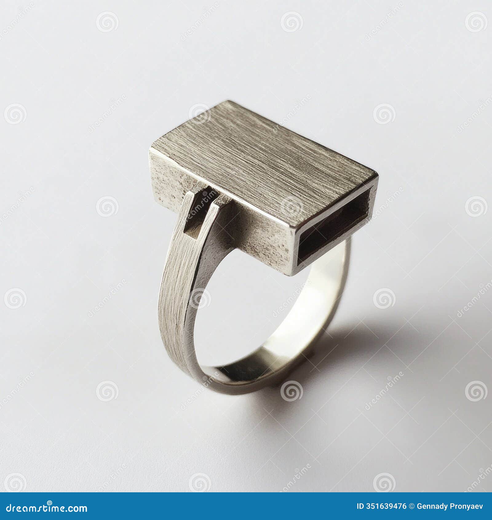 Rectangular Brushed Metal Ring with Modern Geometric Design Stock Photo ...