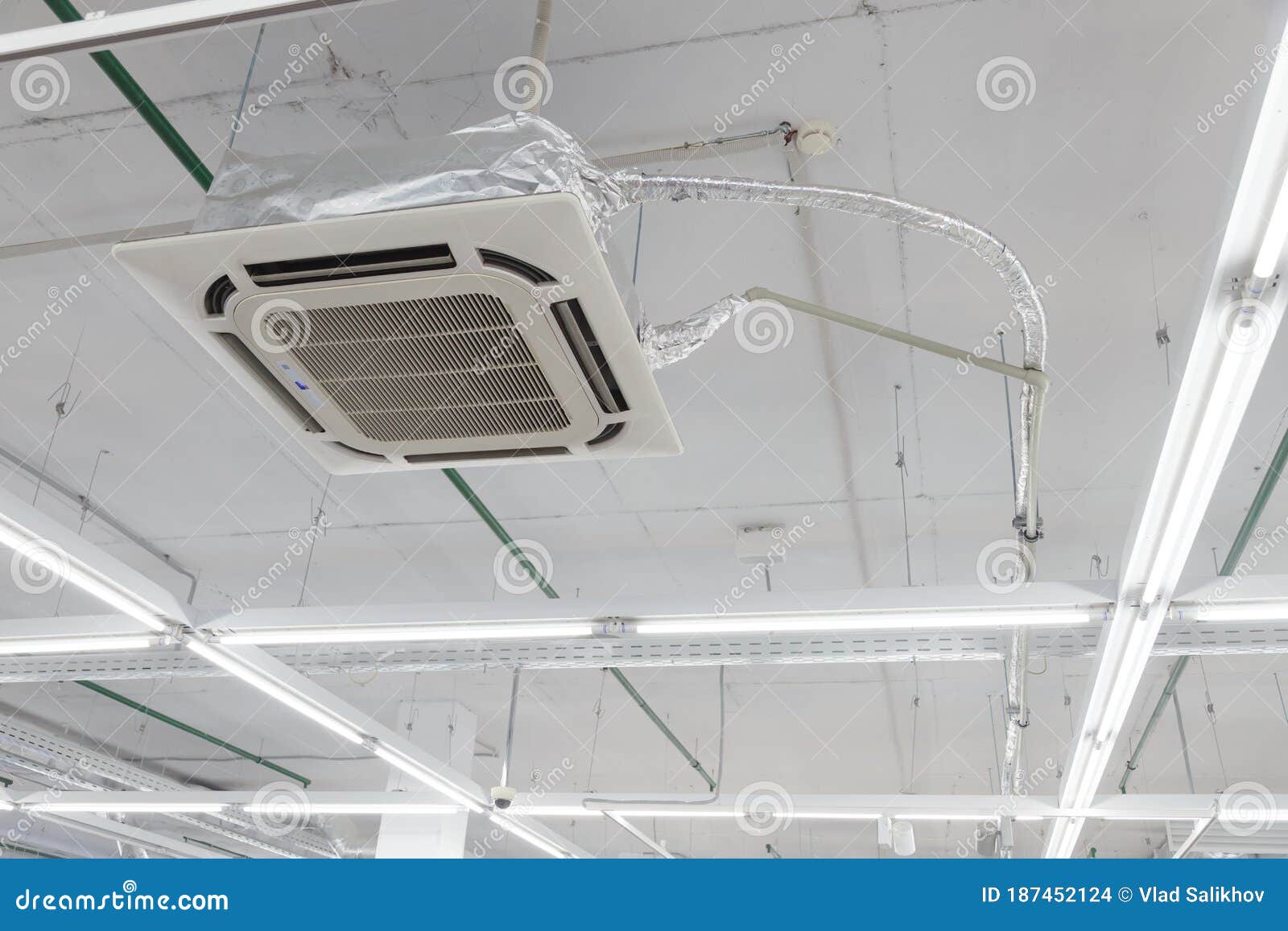 Rectangular Ceiling Air Conditioning Appliance. Fan Coil Hanging On ...