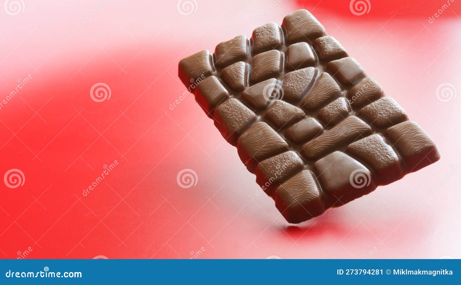 Rectangular Chocolate Bar Falling on a Cursive Gradient Surface Stock ...