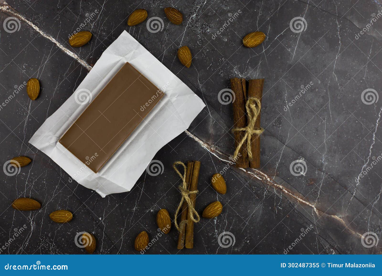 Rectangular Chocolate Bar in an Open Paper Package Stock Image - Image ...