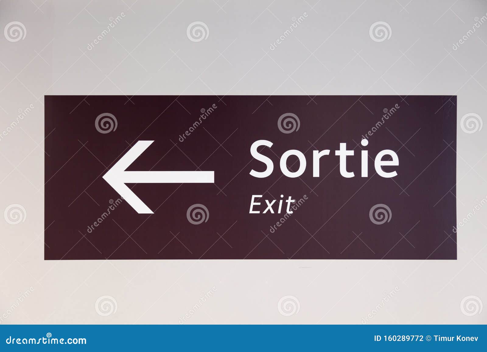 Rectangular Dark Blue Plate with White Letters and Arrow Pointing To ...