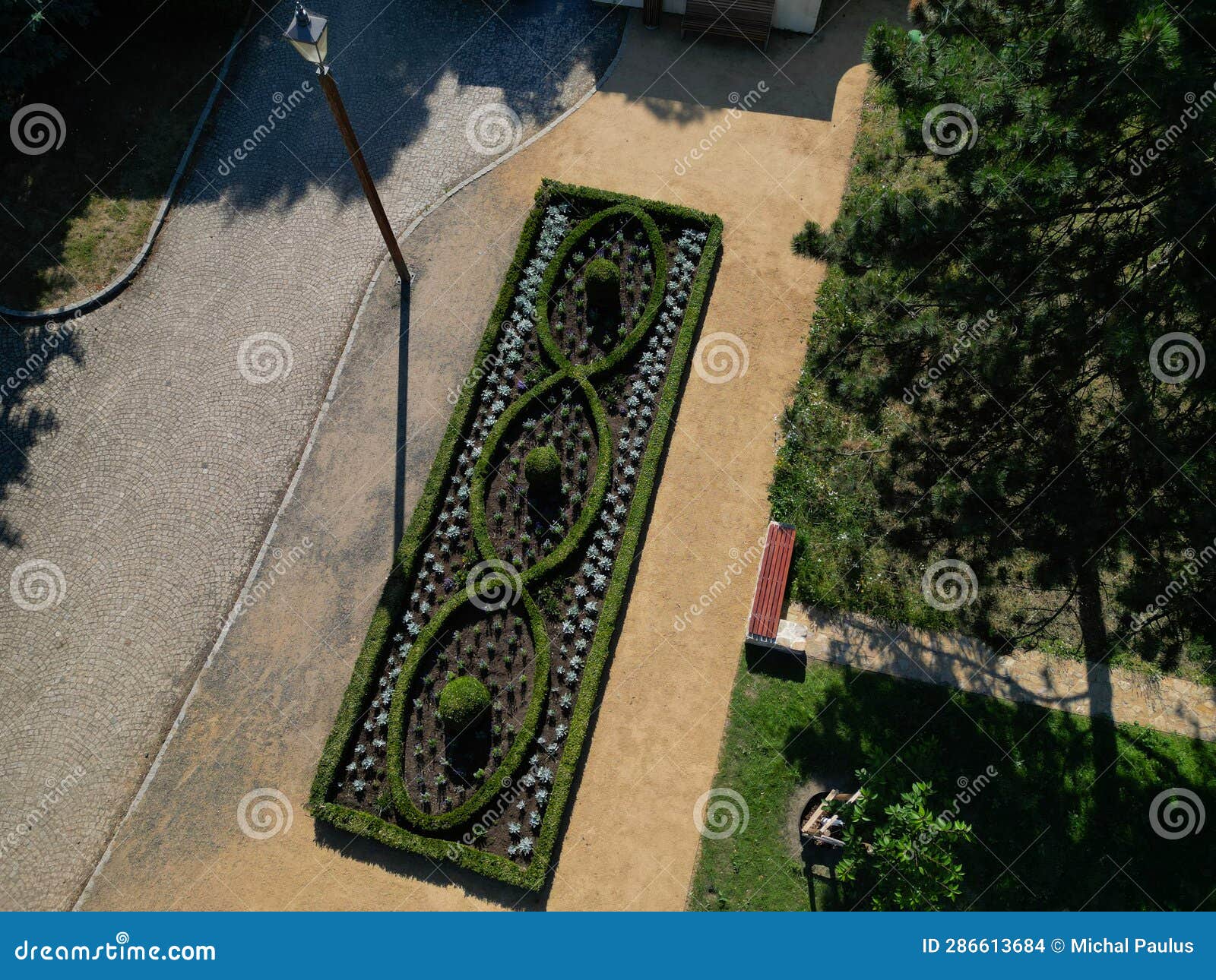 Rectangular Flowerbed Bordered and Divided by a Boxwood Hedge Stock ...