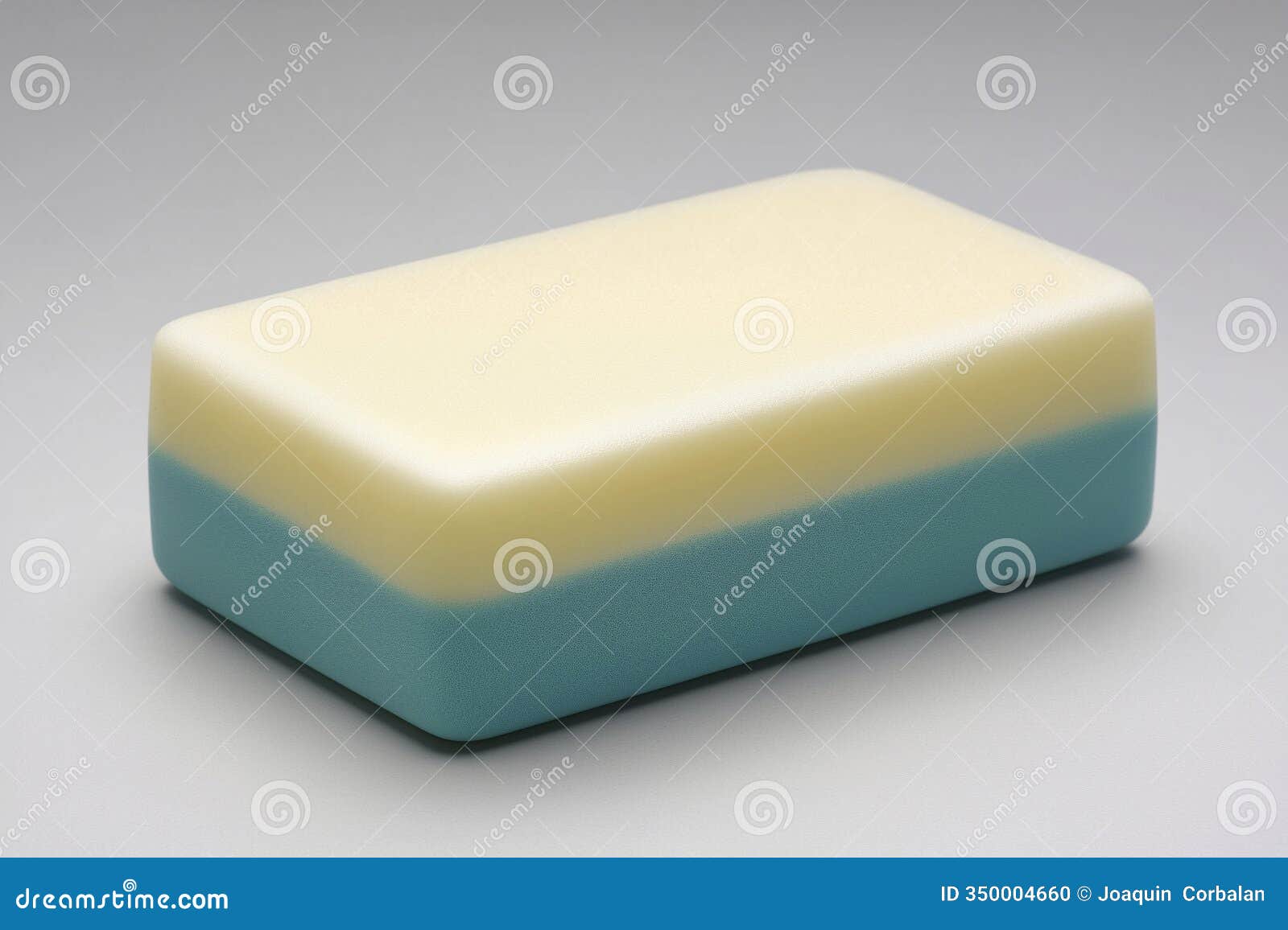 Rectangular Foam Object with a Yellow Base and Teal Top Featuring a ...